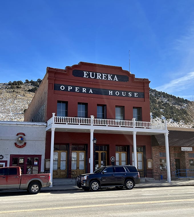 The majestic Opera House stands proudly against blue skies, its brick facade having witnessed 140 years of Eureka's evolving story.