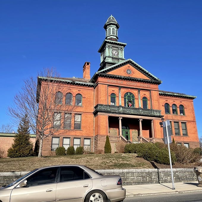 The town hall stands proudly in brick and copper, looking like it's ready to pose for the cover of "Distinguished Buildings Monthly."
