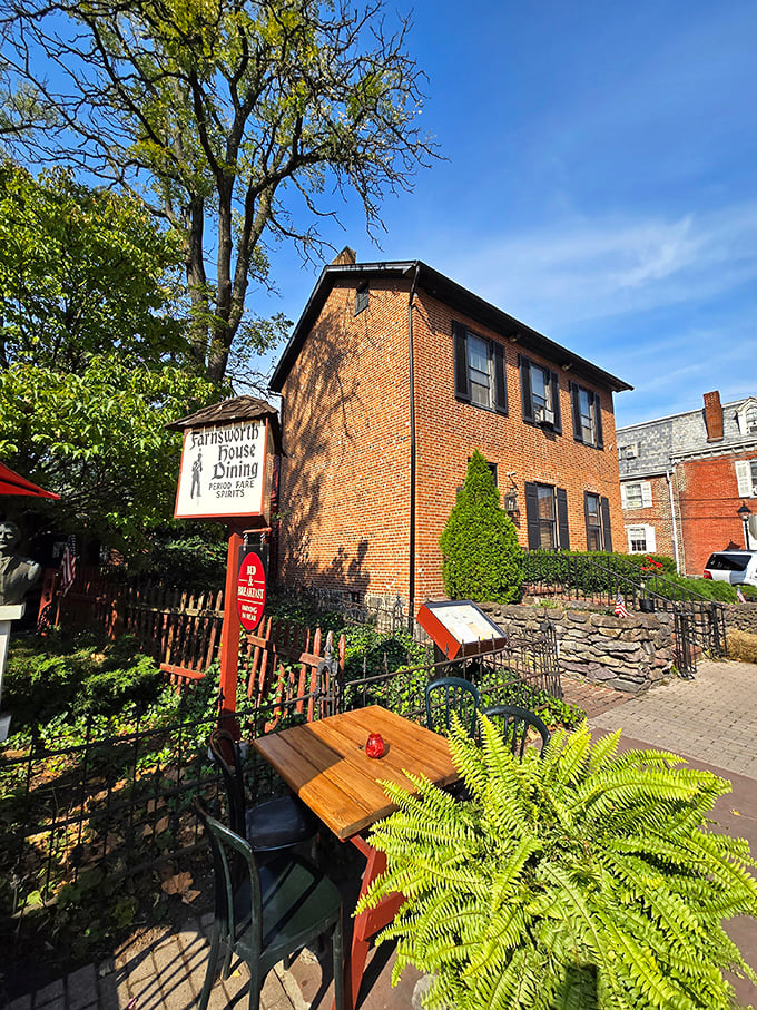 Farnsworth House Inn's outdoor seating invites you to sip your coffee where soldiers once stood. The fern adds a touch of life to centuries of stories.
