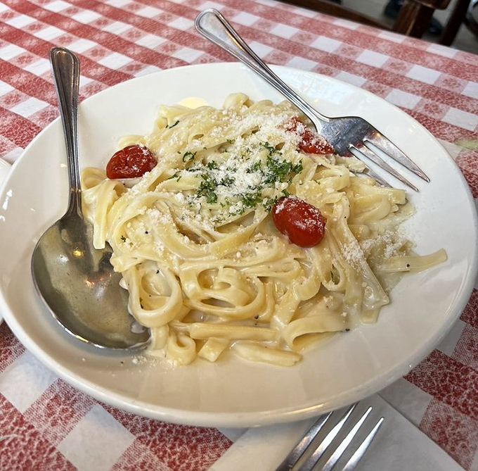 Fettuccine Alfredo so creamy it should come with a warning label: "May induce spontaneous declarations of amore."