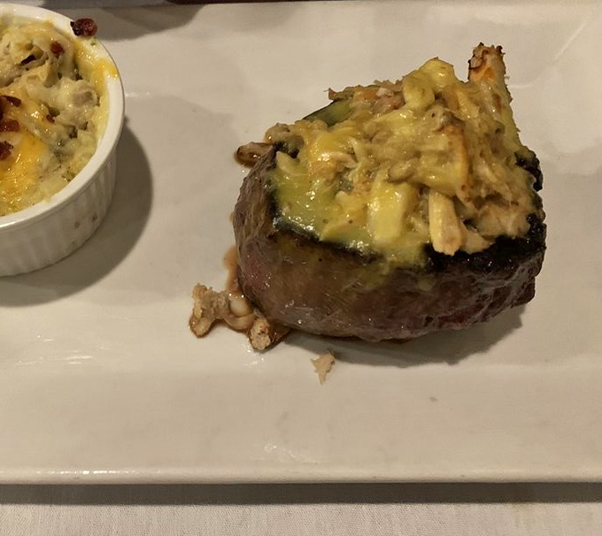 The filet mignon arrives topped with what appears to be a mushroom crust&mdash;proof that sometimes the best innovation is knowing when to enhance, not reinvent.