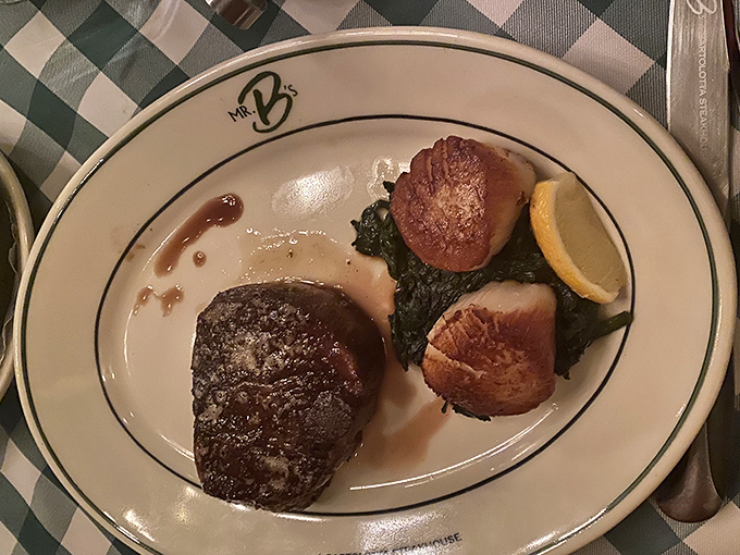 The filet mignon shares the spotlight with scallops and spinach. It's the culinary equivalent of a perfectly balanced jazz trio.