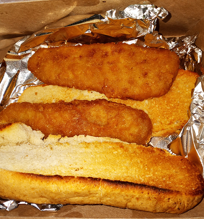 Beer-battered bliss arrives with lemon wedges and the kind of crispy coating that makes dietary resolutions temporarily disappear completely.