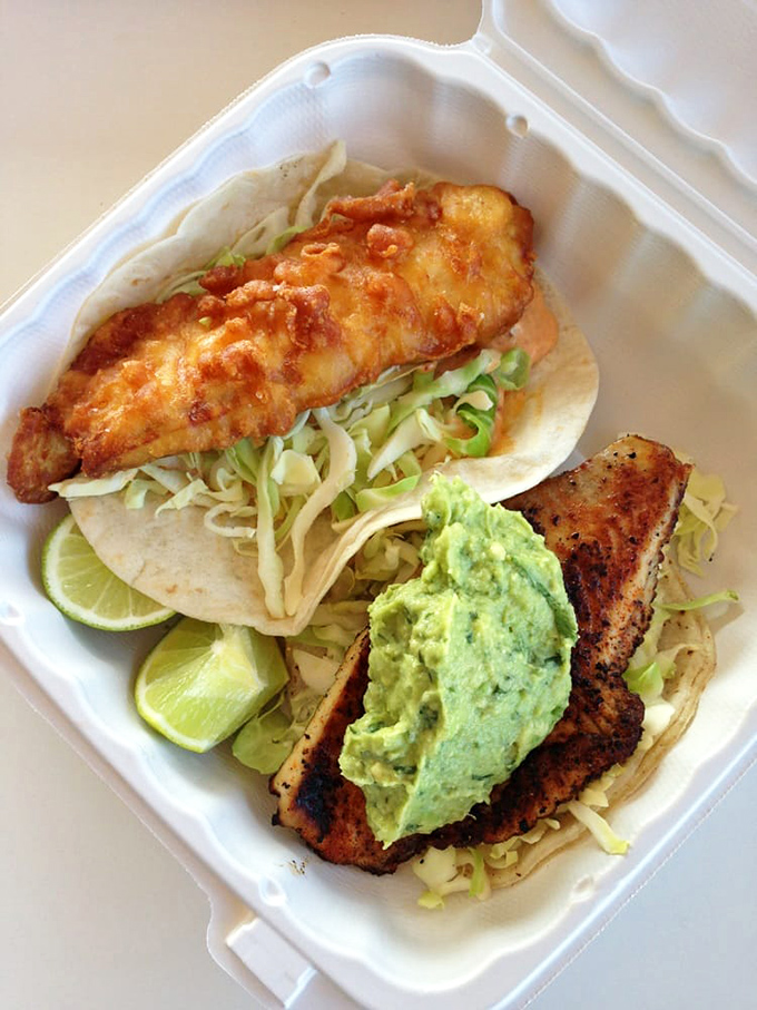 These tacos arrive on checkered paper like chess pieces in a game where everyone wins. The lime stands ready for its supporting role in your flavor adventure.