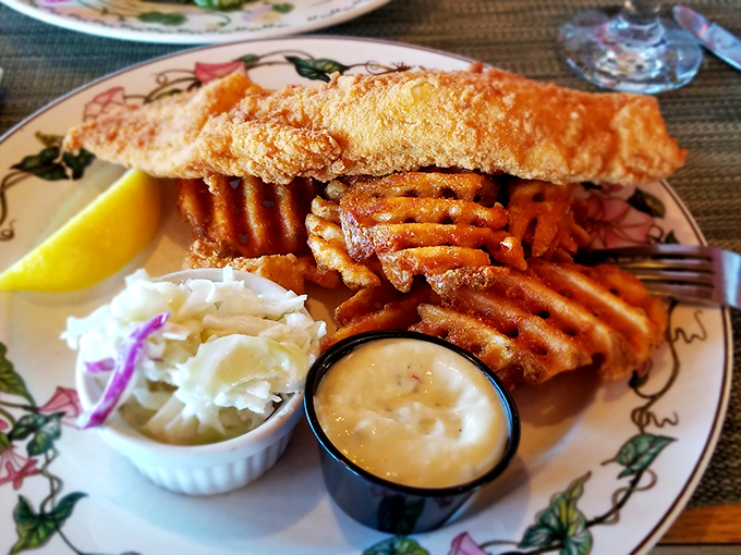 Fish and chips so perfectly golden, they deserve their own Instagram filter. The waffle fries add that extra touch of "why not?"
