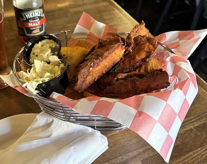 Fish and chips that would make a Londoner homesick – crispy, golden planks of happiness served with house-made slaw in a proper wire basket.