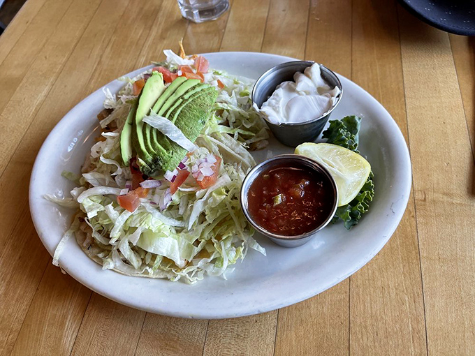 These fish tacos aren't just a meal&mdash;they're California's edible ambassador. Fresh cabbage, creamy sauce, and that perfectly placed avocado deserve diplomatic recognition.