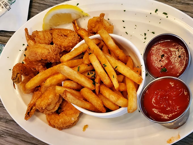 Golden-fried perfection that would make Neptune himself abandon his trident for a fork. The crunch is audible three tables away.