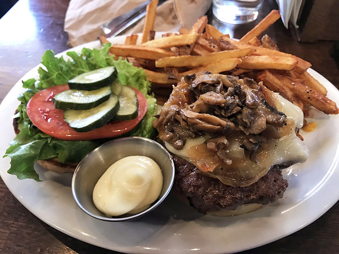 Mushrooms and Swiss: a classic combination elevated to art form. Those fries aren't playing supporting role&mdash;they're co-stars.
