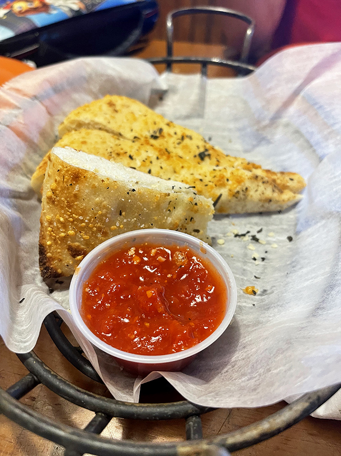 Garlic bread served with marinara for dipping is the kind of simple pleasure that makes life worth living.