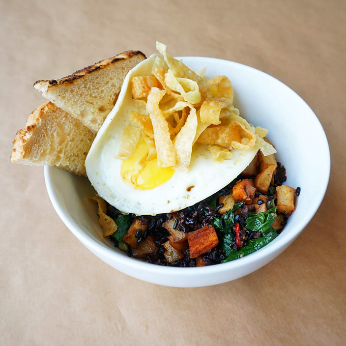 A forbidden hash bowl that's worth breaking any dietary rules for&mdash;topped with a sunny-side egg and crispy tortilla strips.