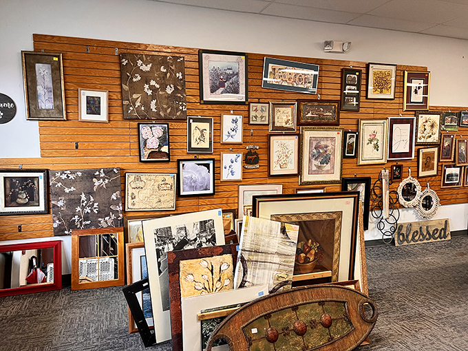 The wall of frames and artwork &ndash; a gallery where someone's "it doesn't match the couch" becomes your statement piece.