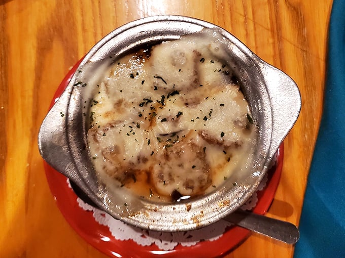 French onion soup that's equal parts comfort and decadence&mdash;a bubbling cauldron of sweet onions and gooey cheese that demands to be broken into.