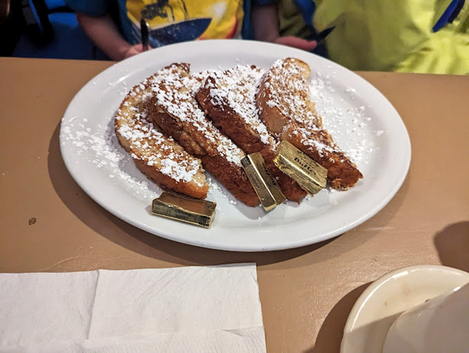 French toast dusted with powdered sugar &ndash; proof that sometimes the simplest pleasures are the most satisfying. Sweet dreams are made of this.