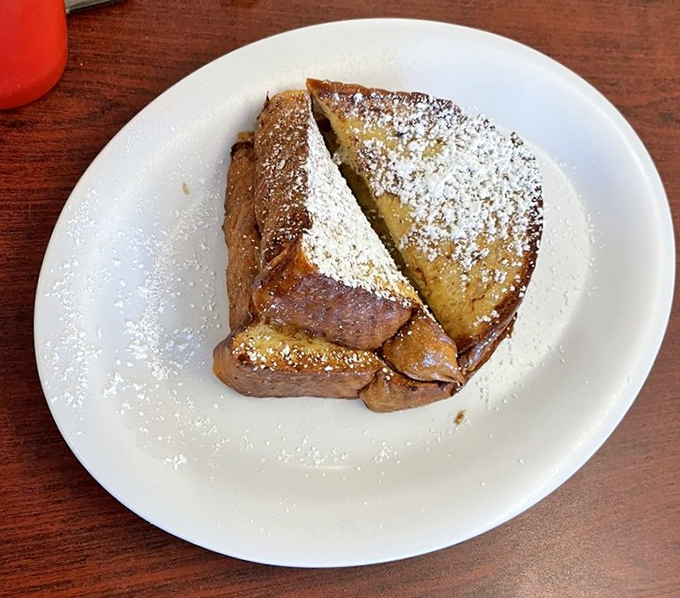 French toast that's achieved that magical caramelized exterior while maintaining a custardy center&mdash;dusted with powdered sugar like fresh Florida snow.