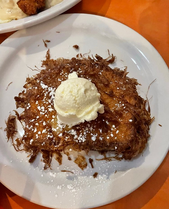 Hash browns so perfectly crispy they crackle with each bite, accompanied by what appears to be breakfast nirvana on a plate.