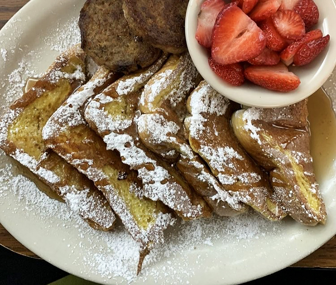 French toast dusted with powdered sugar like a sweet winter wonderland, with strawberries providing that token "health food" element we all appreciate.