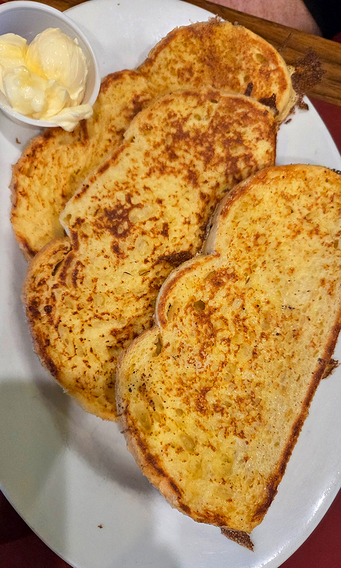 French toast that makes breakfast feel like dessert &ndash; golden, crispy edges giving way to custardy centers that practically beg for a drizzle of maple syrup.