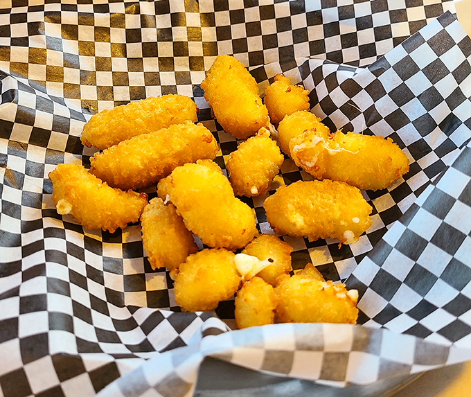 Golden nuggets of joy&mdash;these cheese curds have been transformed from humble dairy to crispy, molten treasures worth fighting over.