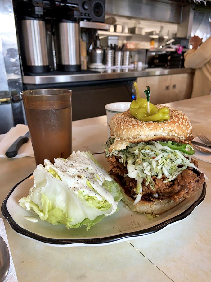 A fried chicken sandwich that doesn't need Instagram filters&mdash;just napkins. That slaw isn't a garnish; it's an essential supporting actor.