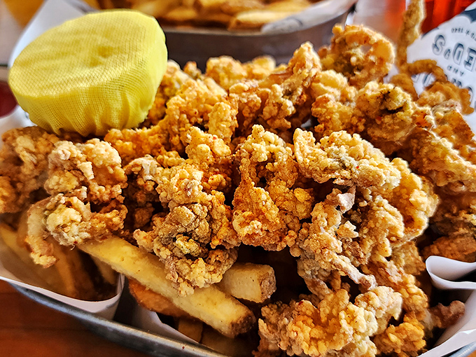 These fried clams aren't just food—they're time travel to summers on the Cape. Crispy, briny, and utterly irresistible with those hand-cut fries.