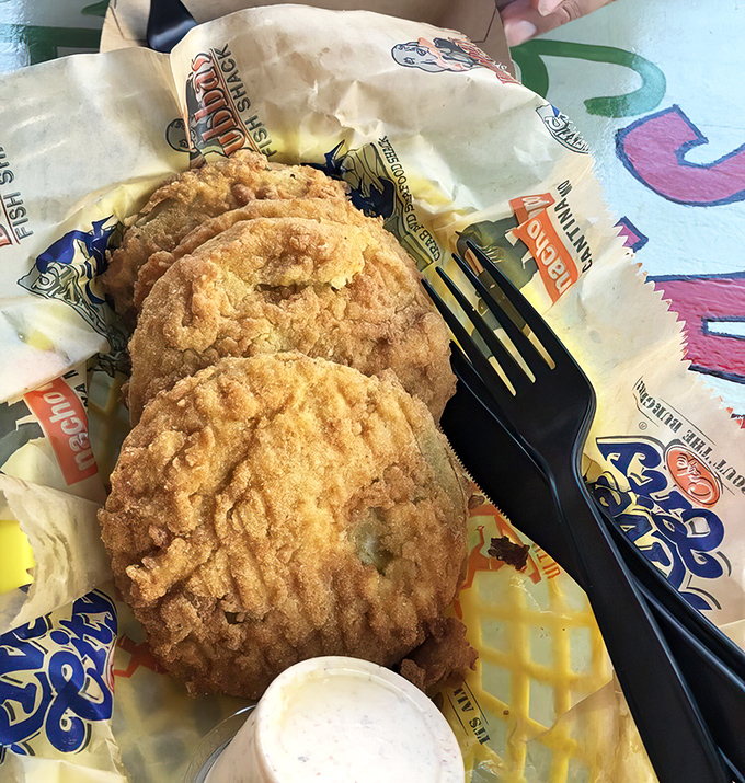 Whoever first decided to fry green tomatoes deserves a Nobel Prize. These crispy discs transform from garden outcasts to Southern royalty.