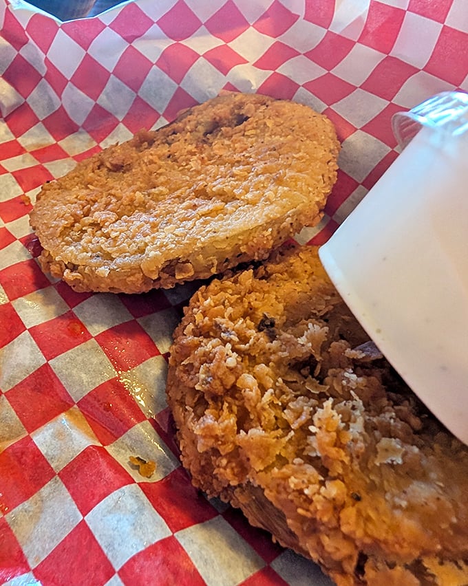 These aren't your average tomatoes &ndash; they've graduated with honors from the deep fryer, earning a crispy golden crust that crackles with each bite.