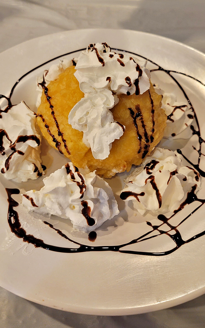 Fried ice cream that defies physics&mdash;hot, crispy exterior giving way to cool, creamy center. Dessert magic that makes you question everything you thought you knew.