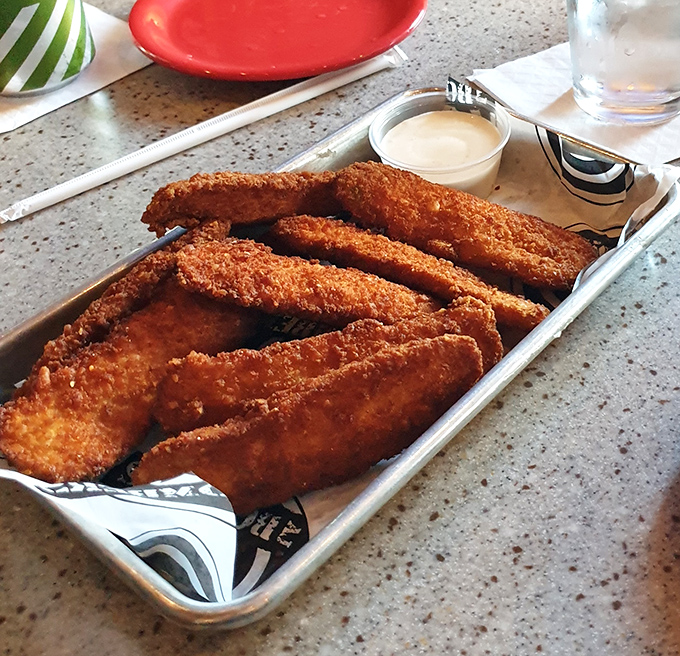 Fried pickles: Where tangy meets crunchy in a dance so beautiful it deserves its own Broadway show. The ranch dip plays supporting actor perfectly.