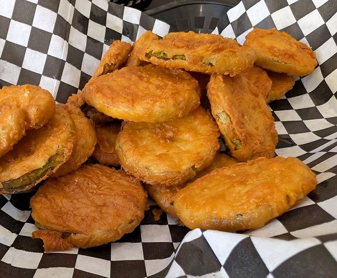 Fried pickles: where tangy meets crispy in a basket of pure genius. The perfect sidekick to Nashville hot chicken when your taste buds need a moment.