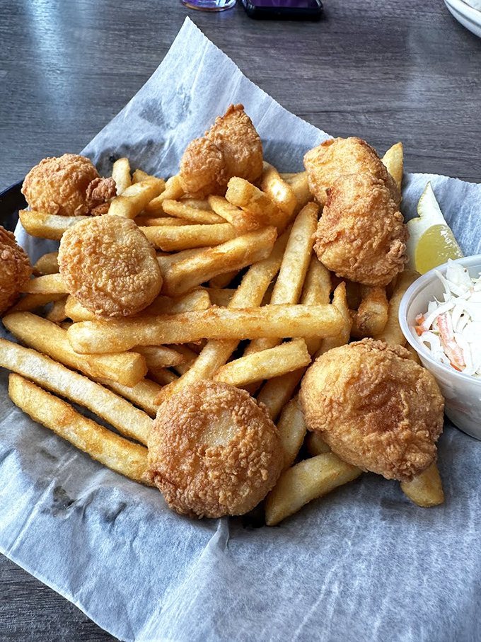 Fried scallops and fries that could make a seafood skeptic weep with joy&mdash;crispy, golden nuggets surrounded by perfectly cooked potato companions.