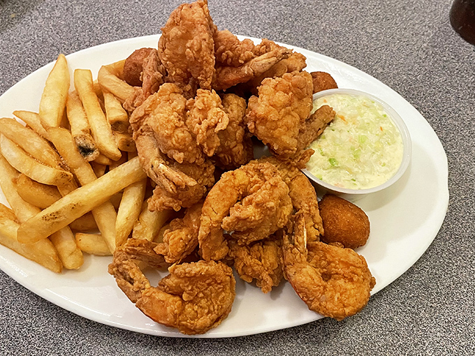 These golden-fried shrimp aren't just cooked&mdash;they're transformed. Crispy exterior giving way to that perfect snap that makes you close your eyes in appreciation.