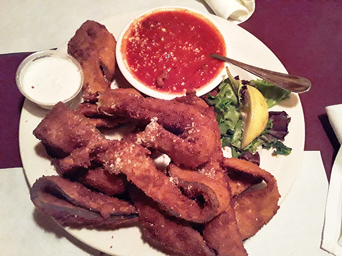 Golden-fried zucchini strips dusted with parmesan&mdash;proof that vegetables can be both virtuous and deliciously sinful at the same time.