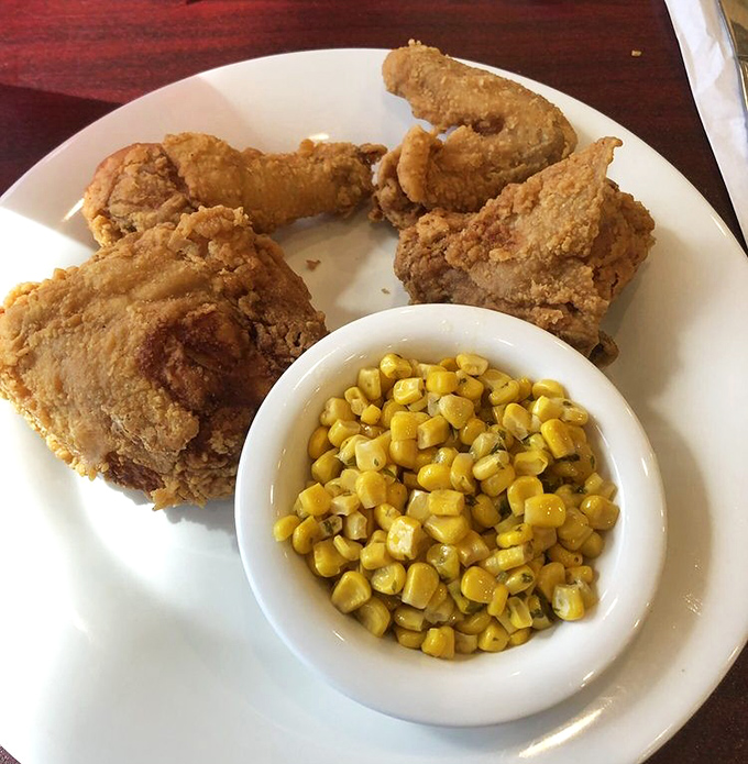 Southern fried chicken so perfectly golden, it makes the Florida sunshine jealous. That corn isn't a side dish&mdash;it's sweet moral support.