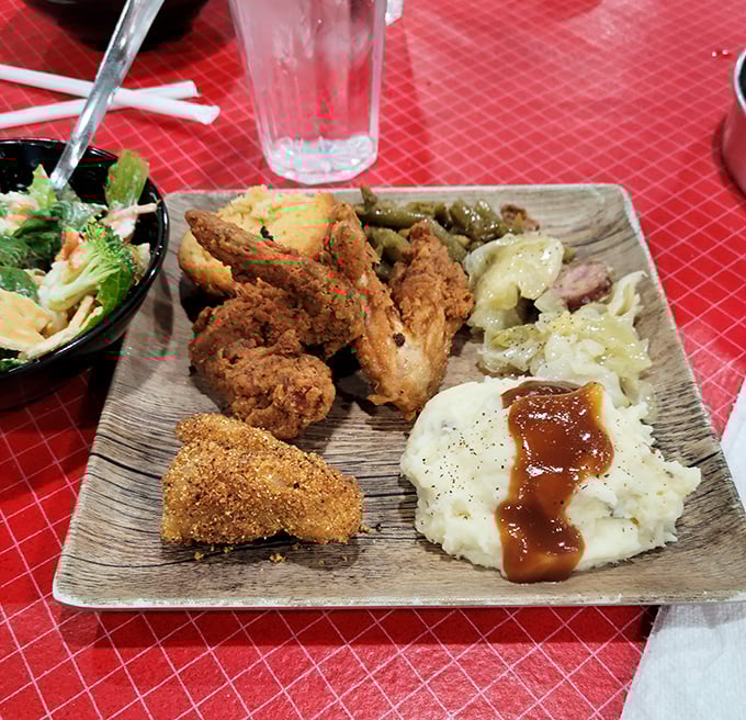 When fried chicken, mashed potatoes, and green beans share a plate, you know you're in a place that understands the architecture of comfort food.