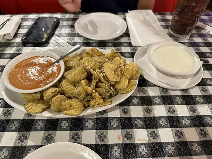 These aren't just fried pickles &ndash; they're crunchy little flavor bombs served with dipping sauces that'll have you plotting your next visit before you leave.
