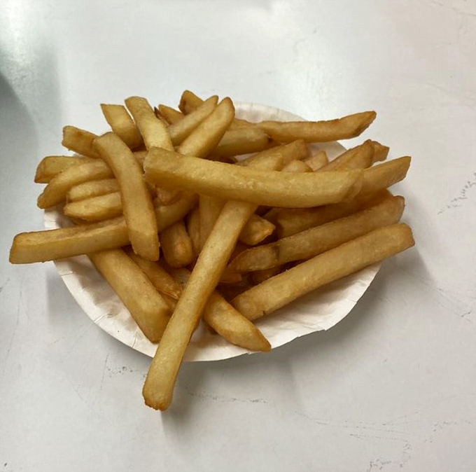 Golden, crispy fries that don't need truffle oil or fancy aioli to make their simple, potato-forward statement.