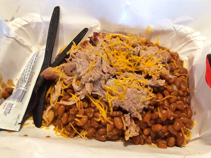 The Frito Pie&mdash;where humble corn chips meet smoky pulled pork and beans in a beautiful marriage of textures and flavors.