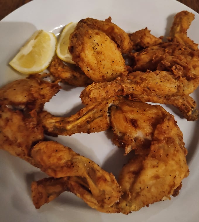 Crispy, golden-fried frog legs with a squeeze of lemon&mdash;the kind of adventurous option that separates curious eaters from the merely hungry.