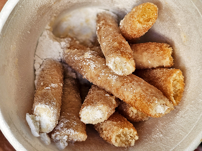 Funnel cake fries—because sometimes you need dessert disguised as a side dish. The state fair favorite reimagined for year-round indulgence.