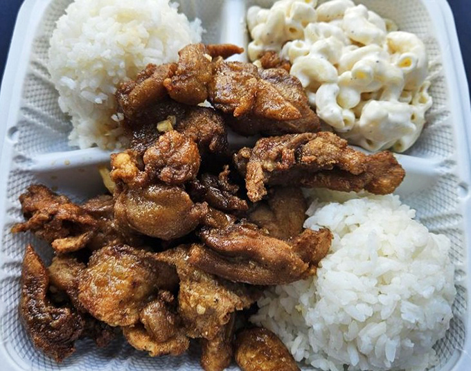 This garlic chicken plate lunch isn't just a meal&mdash;it's Hawaii's soul on a styrofoam platter, complete with the obligatory mac salad.