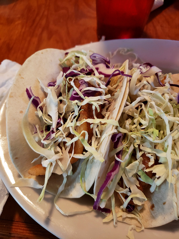 Gator tacos topped with vibrant slaw &ndash; where Florida meets Mexico in a culinary handshake that benefits your taste buds.