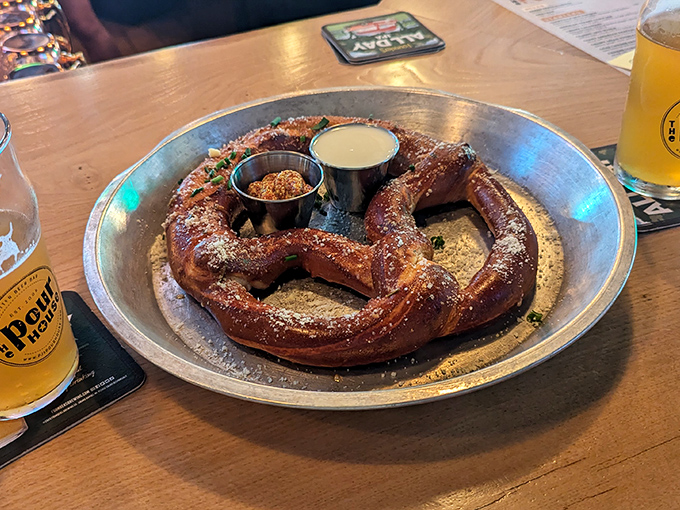 The pretzel that launched a thousand road trips. This glorious carb monument comes with dipping sauces that deserve their own fan clubs.