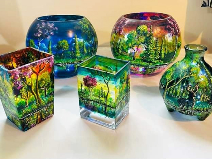 These hand-painted glass vases transform ordinary flowers into gallery-worthy displays. Instant art without the artistic talent required!