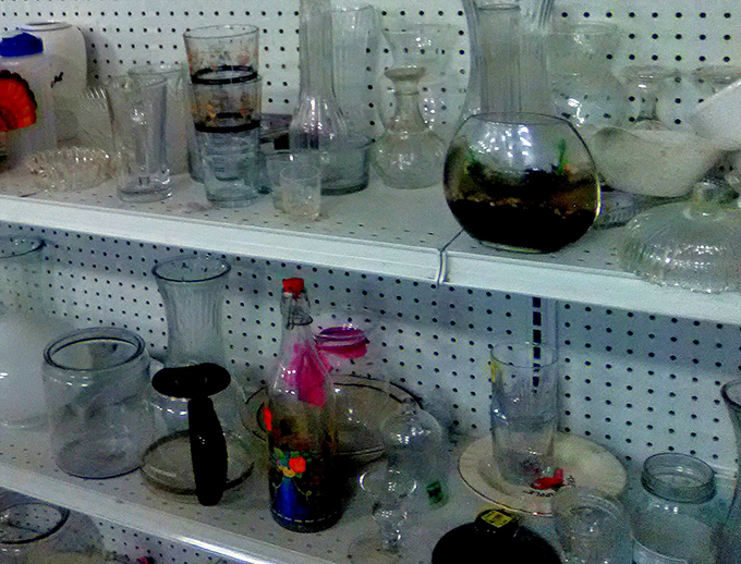 Glassware galore! Crystal, everyday tumblers, and that one weird decorative piece someone's mother-in-law gave them&mdash;all waiting for your dinner party debut.