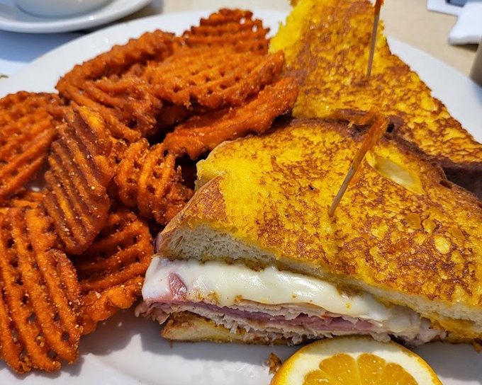 Not your childhood grilled cheese. This grown-up version with waffle fries is what happens when nostalgia gets a culinary degree.