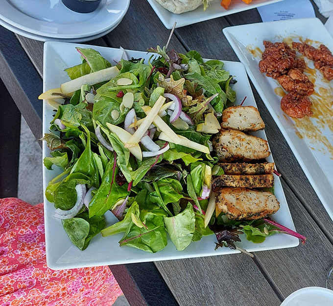 "I'm eating healthy," you'll say, ordering this gorgeous salad. Fresh greens, grilled chicken, and colorful veggies make virtue taste surprisingly delicious.