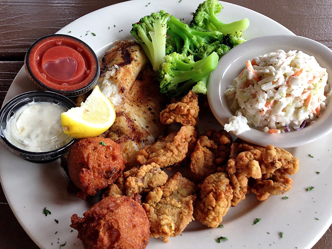 The seafood sampler that settles all arguments—blackened fish, golden-fried oysters, and sides that don't feel like afterthoughts.