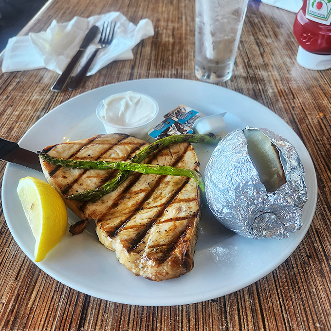 Perfectly grilled swordfish with grill marks so photogenic they deserve their own Instagram account.