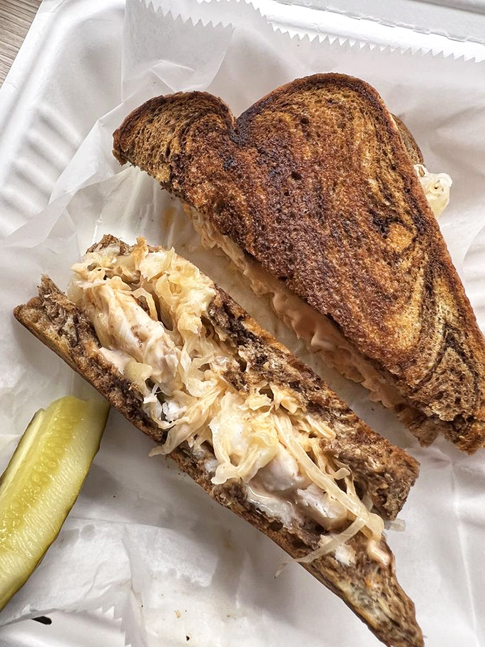 The Grouper Reuben proves that sometimes culinary marriages of convenience turn into passionate love affairs. That sauerkraut and grouper combo is surprisingly magical.